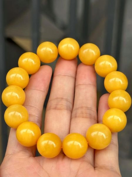 鸡油黄蜜蜡手串多少钱_如何辨别真假-第1张图片-山城妙识 鸡油黄蜜蜡手串多少钱_如何辨别真假-第1张图片-山城妙识